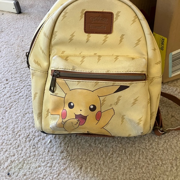 Loungefly | Bags | Loungefly Pikachu Lightning Mini Backpack Cream ...